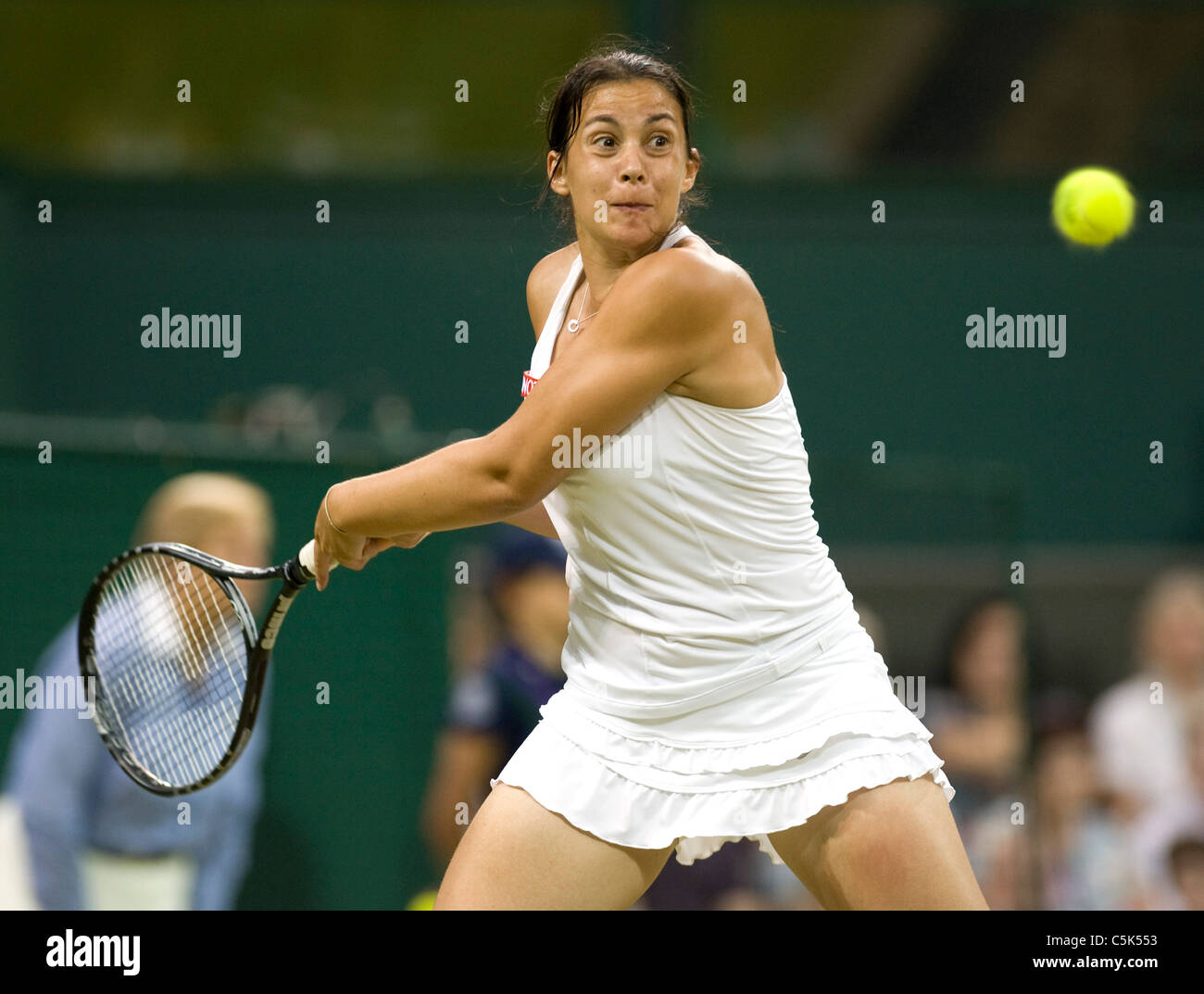 Marion Bartoli (FRA) in action during the 2011 Wimbledon Tennis ...