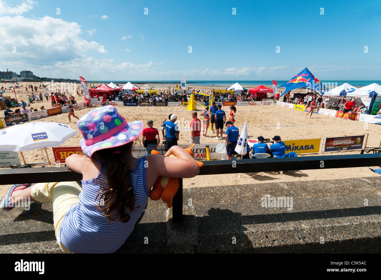 A young girl watching the Margate Masters Beach Volleyball ...