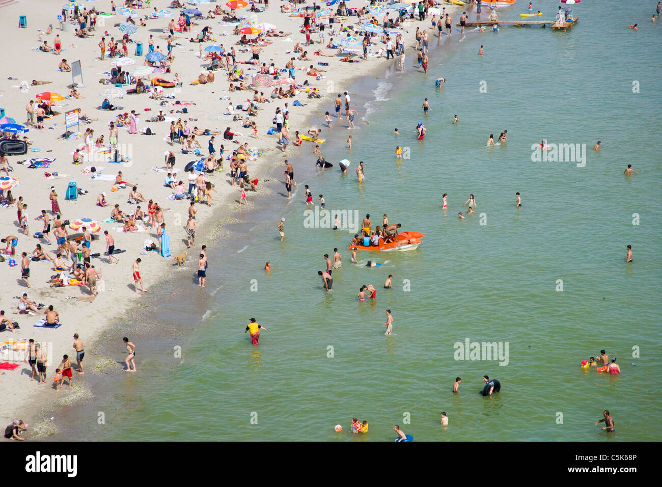 People enjoying the beach and swimming in the sea, aerial, Buyukcekmece ...