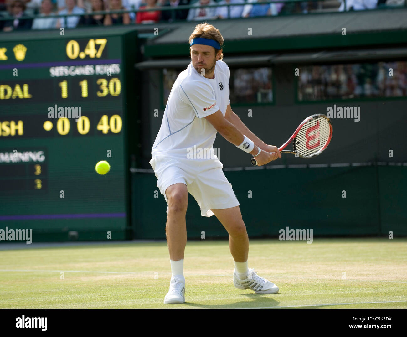 Mardy Fish (USA) in action during the 2011 Wimbledon Tennis ...