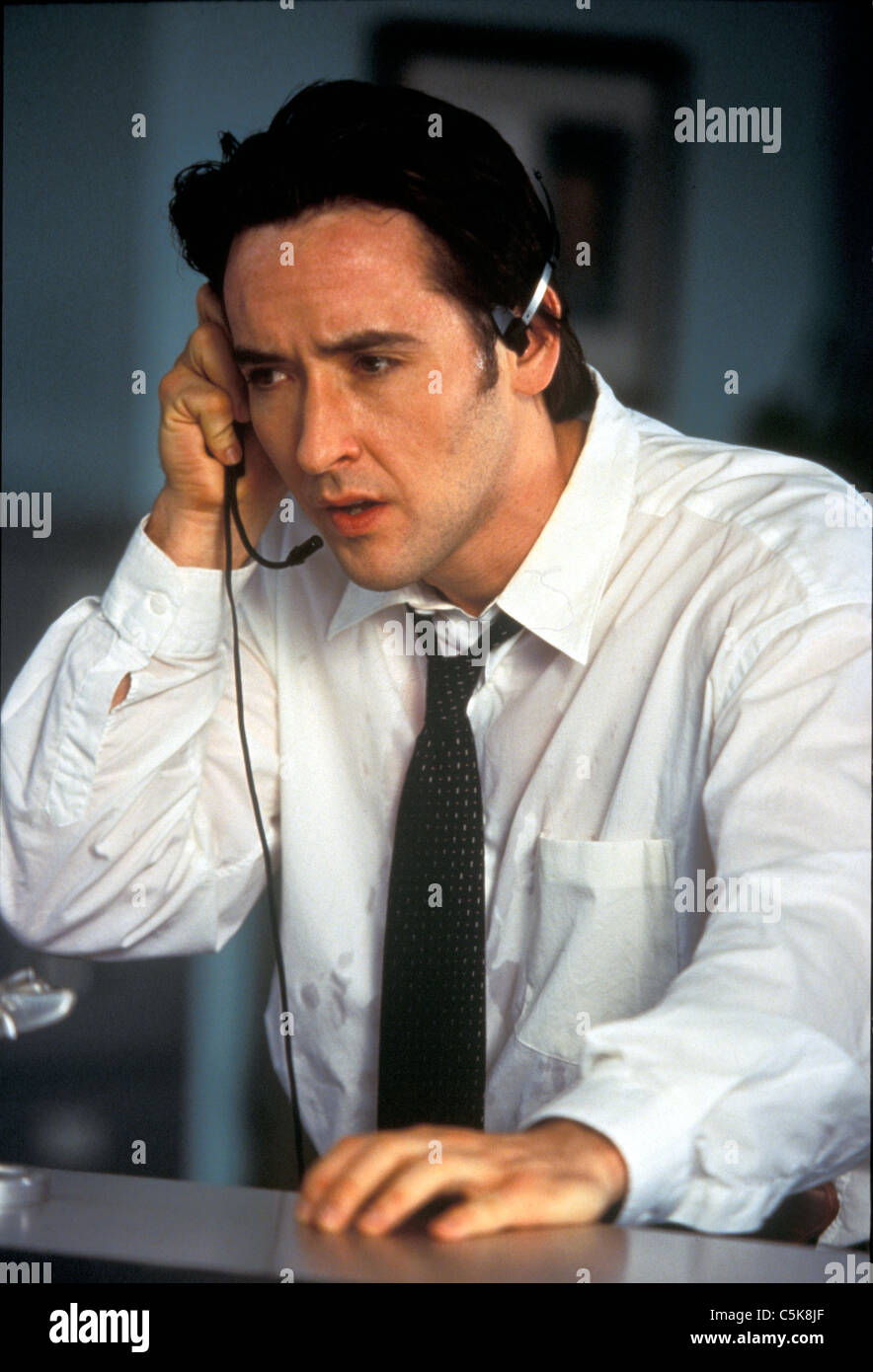 Con Air Year : 1997 USA John Cusack Director : Simon West Stock Photo ...