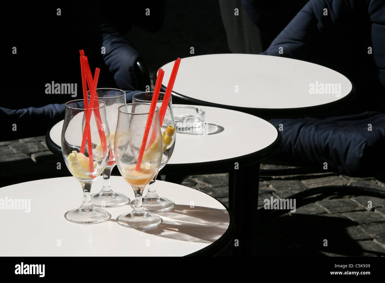 empty cocktail glasses on table at outside bar restaurant Stock Photo ...