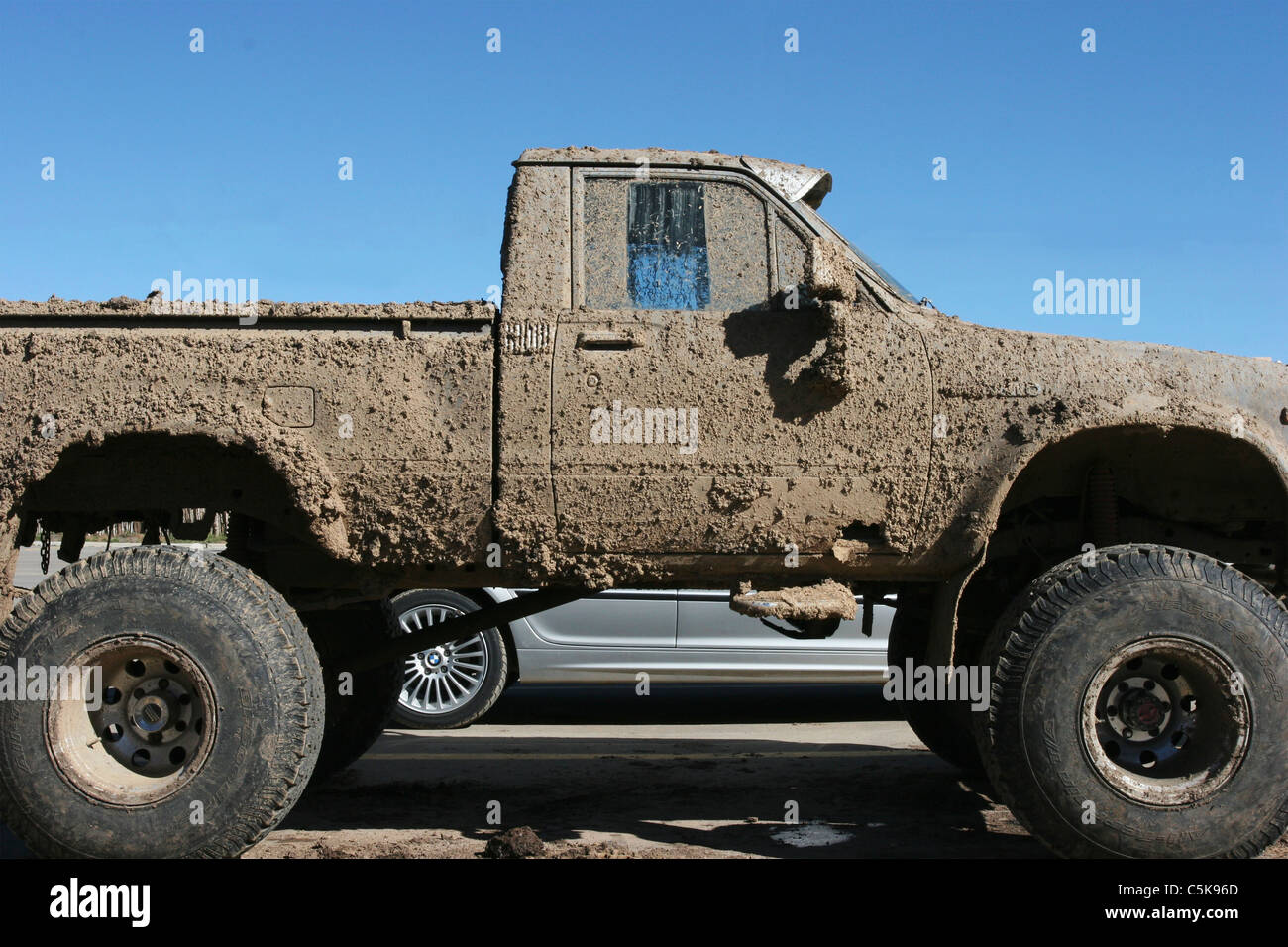 Mud-covered pickup truck Stock Photo - Alamy
