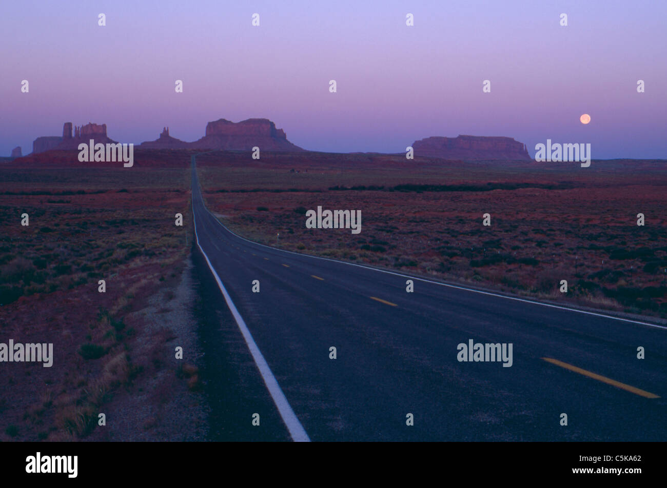 Highway 163 into Monument Valley at dawn Stock Photo - Alamy