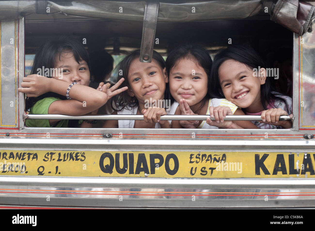 Children in Jeepney reaching the site of the protest rally in Quezon ...