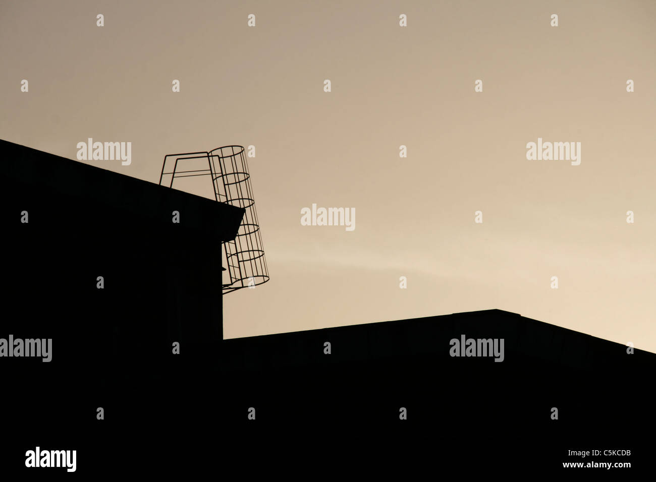 emergency safety security escape ladder on top of building Stock Photo ...