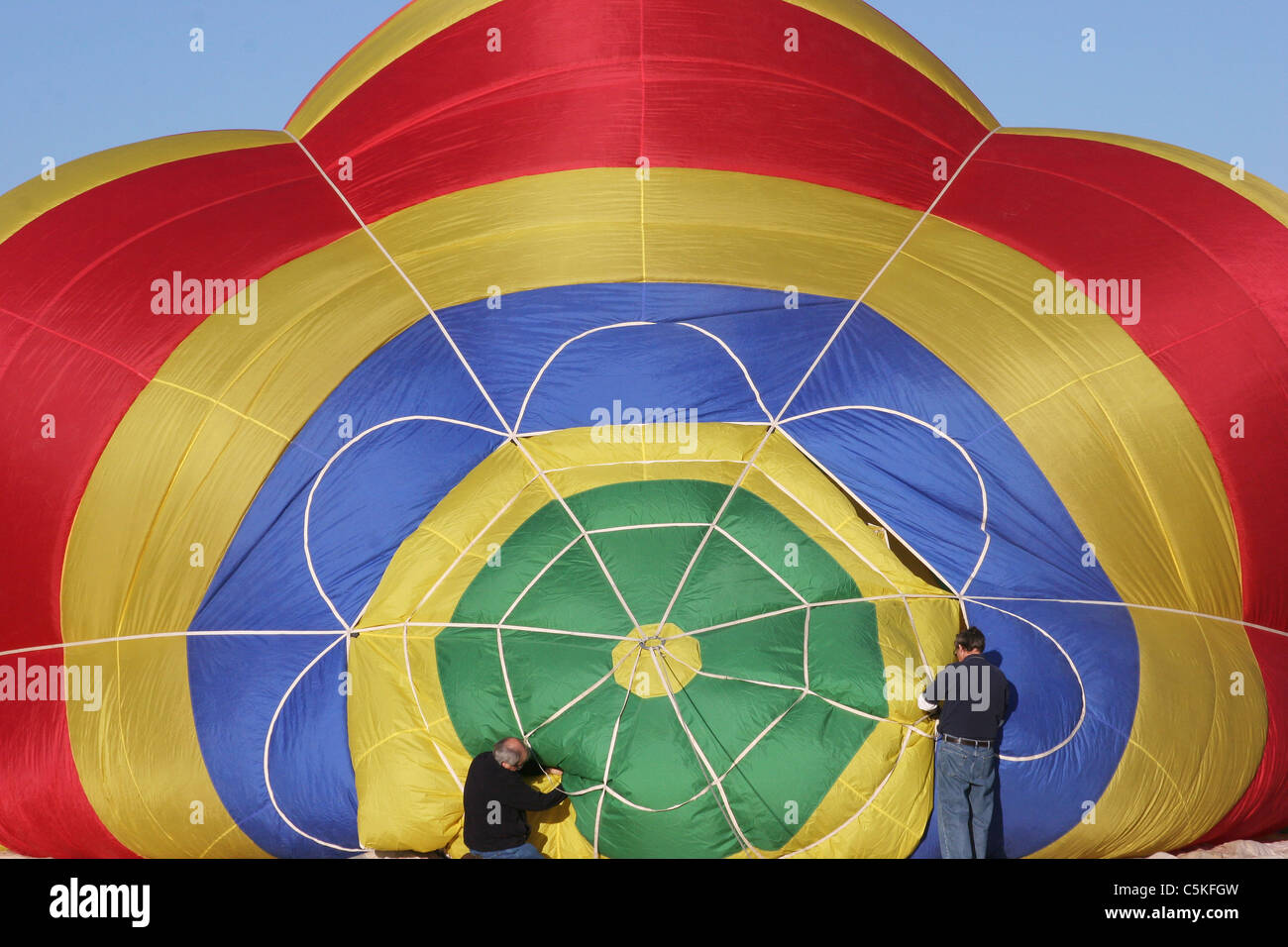 Preparing a hot air balloon for lift off Stock Photo - Alamy