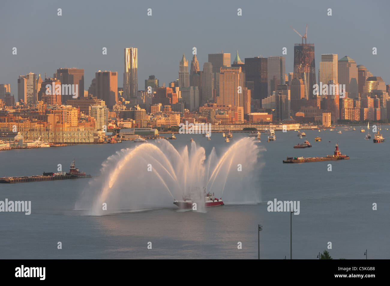 FDNY Marine 1 fire boat "Three Forty Three" puts on a water show on the ...