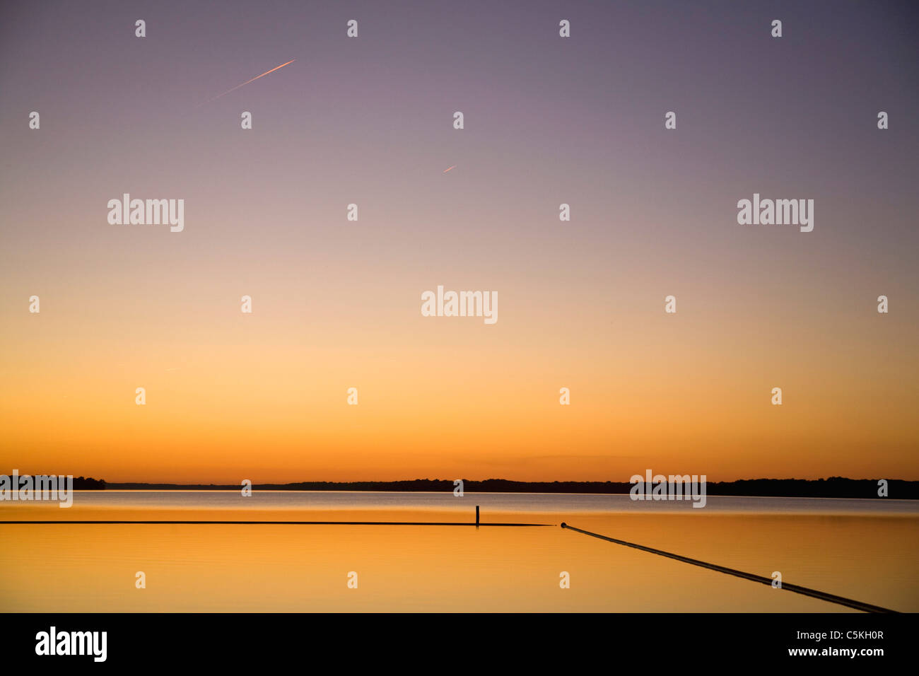 Sunset reflected on the water hi-res stock photography and images - Alamy