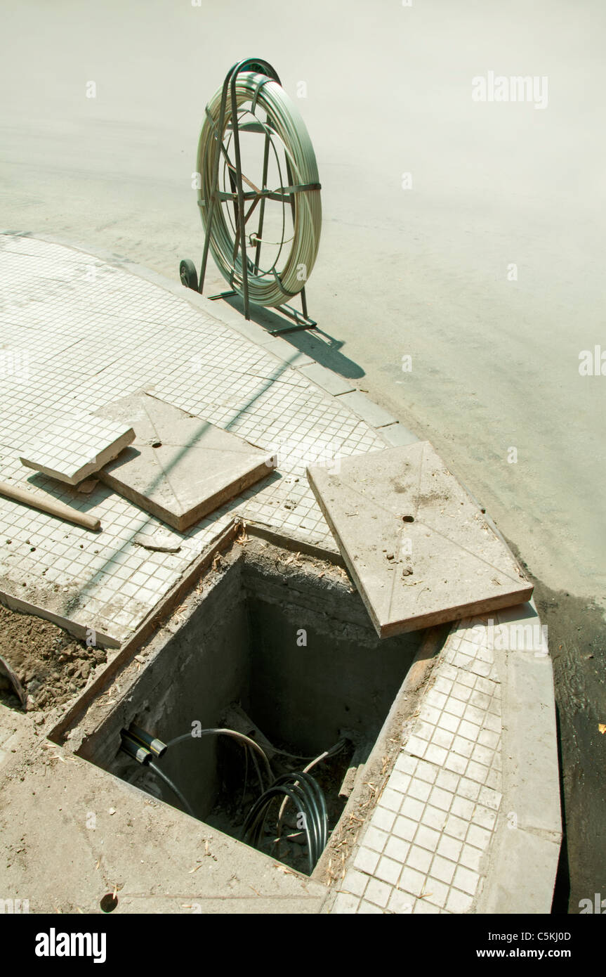 Wiring with fiber optic cables underground.Telecommunications equipment ...