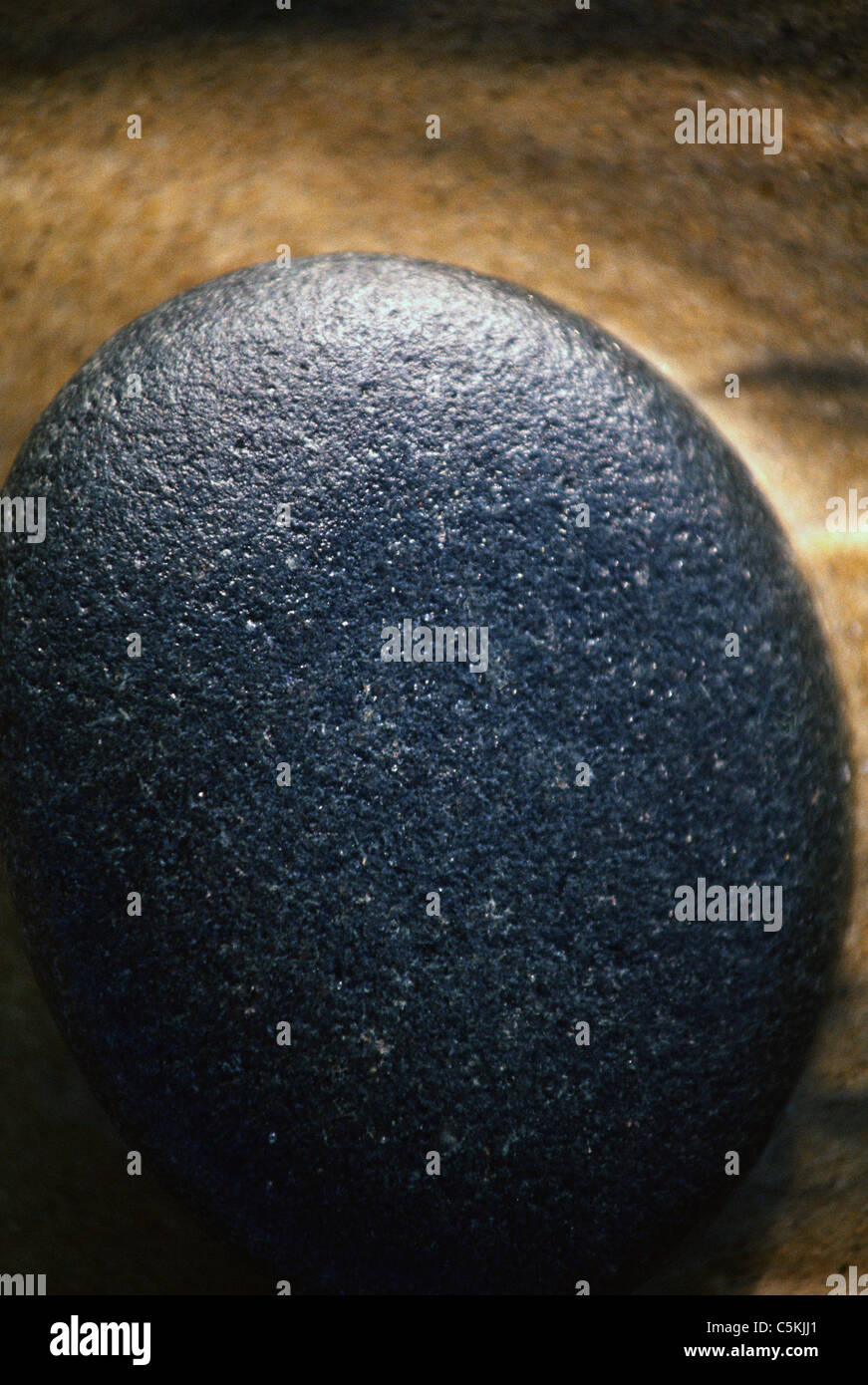smooth black stone on beach, Chilmark, MA Stock Photo - Alamy