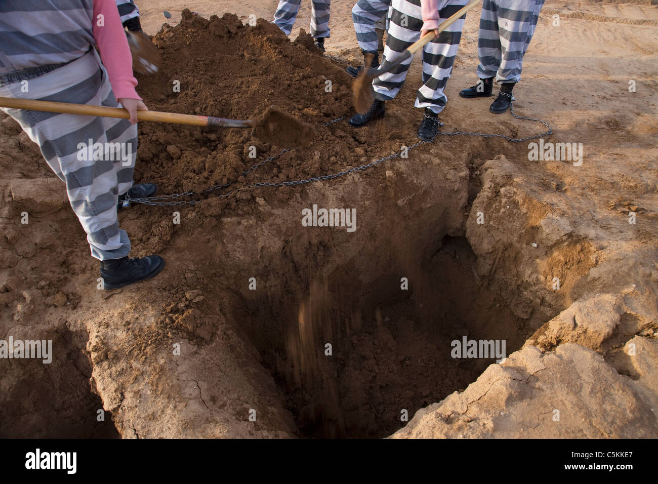 Inmates of the female chain gang bury an infant near Phoenix Arizona ...