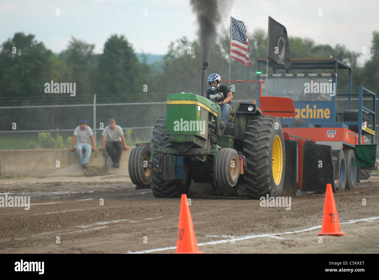 A man drives his tractor in a tractor pull competition at the Addison ...