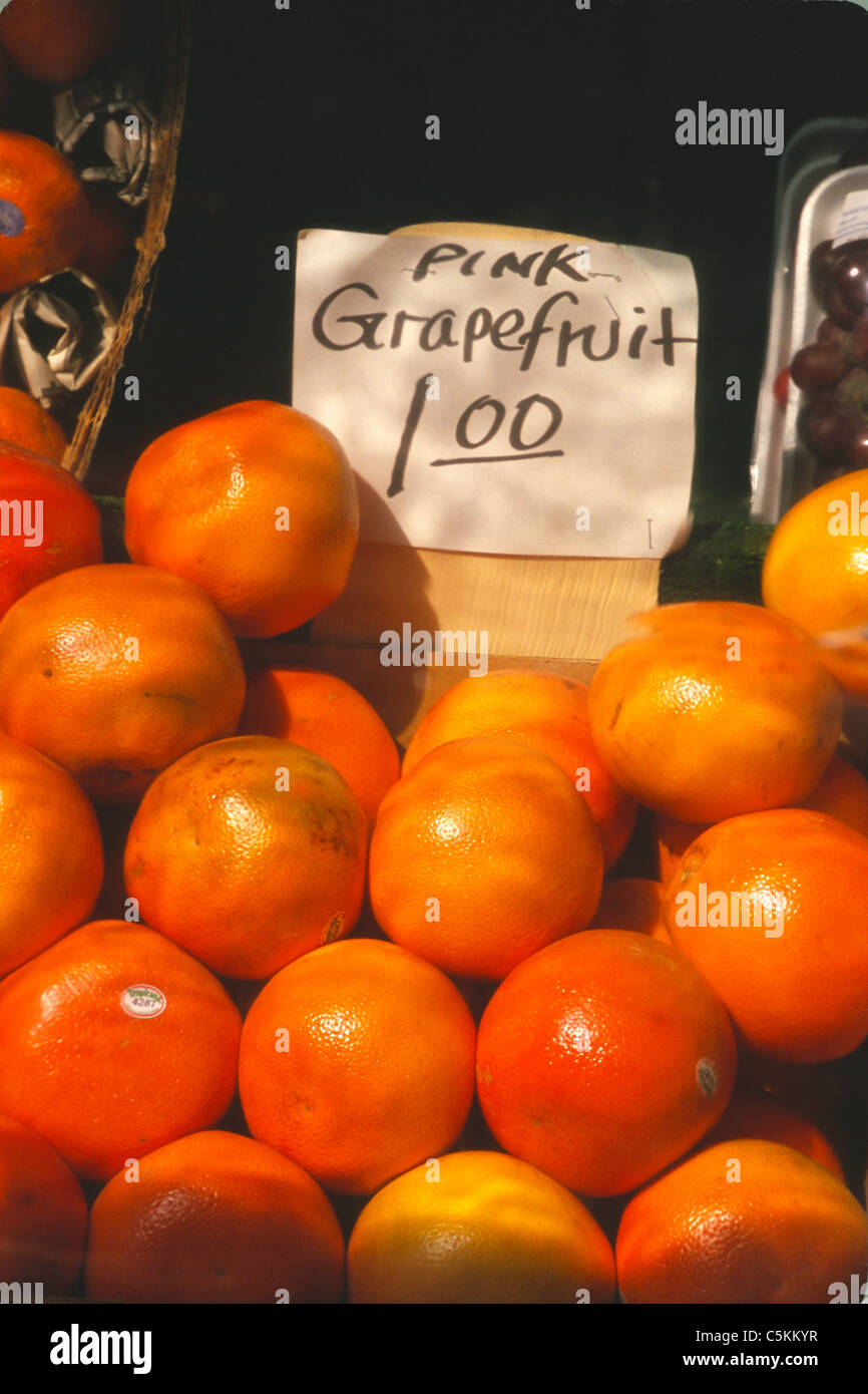 Pink Grapefruit for sale, bodega, NYC Stock Photo - Alamy