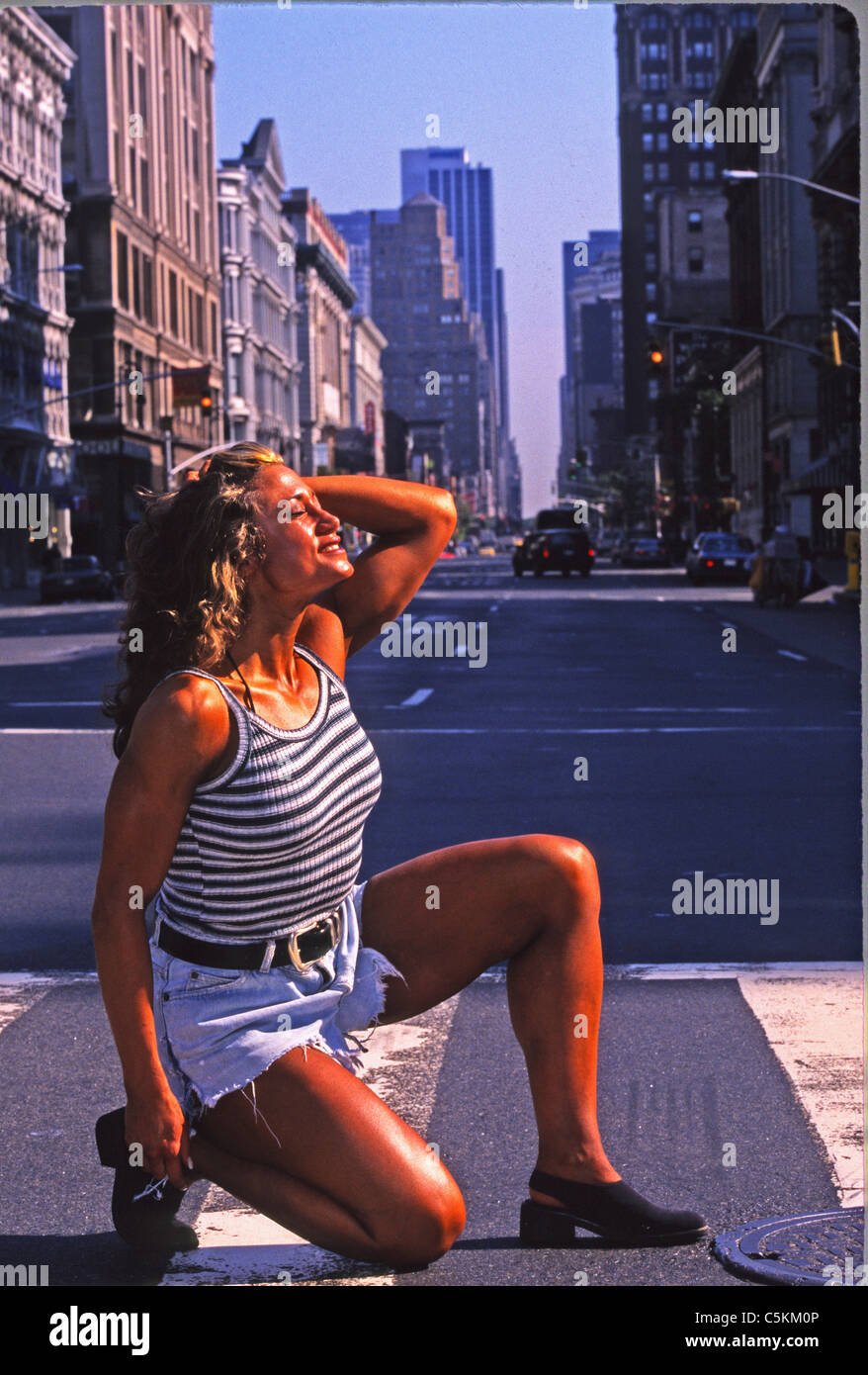 Female body builder posing hi-res stock photography and images - Alamy