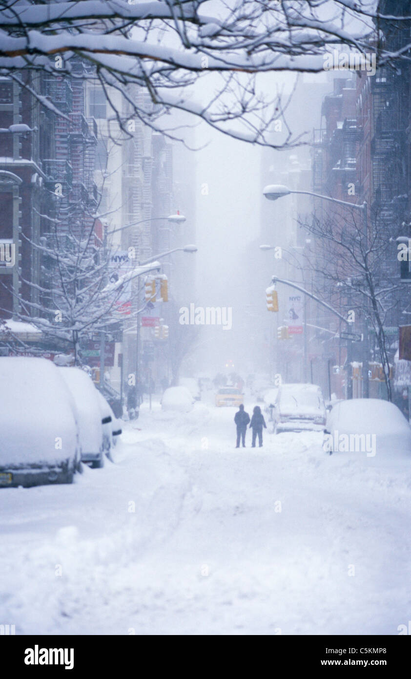 Pedestrians in snowfall, SoHO, New York City Stock Photo - Alamy