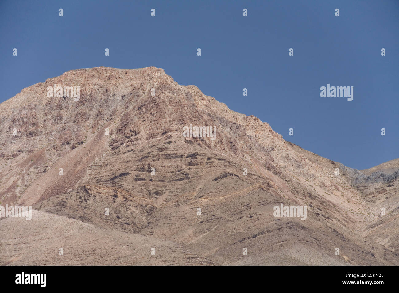 Small peak with folded strata, Beatty, NV Stock Photo - Alamy