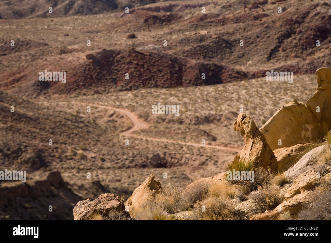 Dirt road and rock outcrop, Death Valley, CA Stock Photo - Alamy