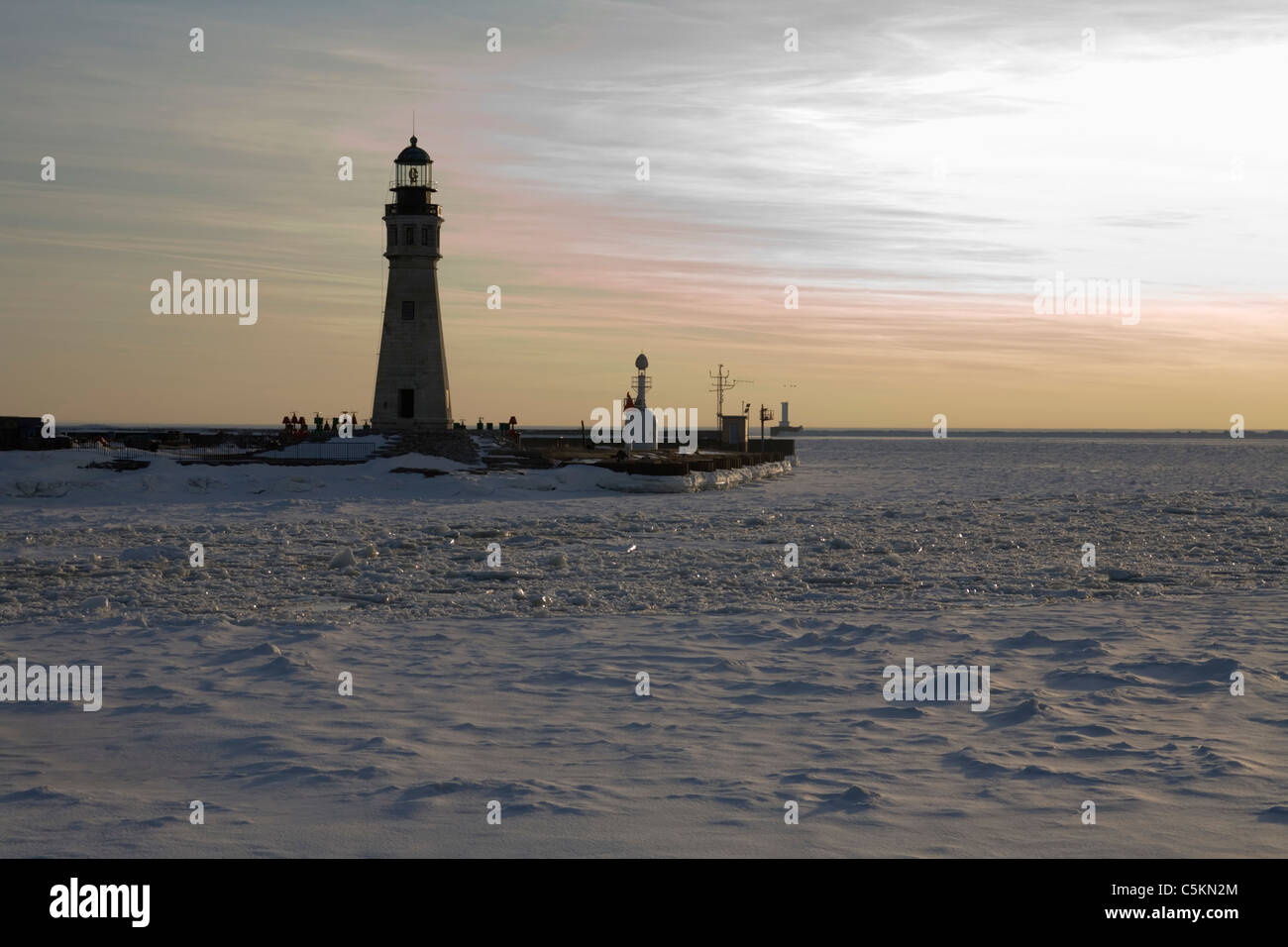 Lighthouse, sunset and ice choked Buffalo River, NY Stock Photo - Alamy