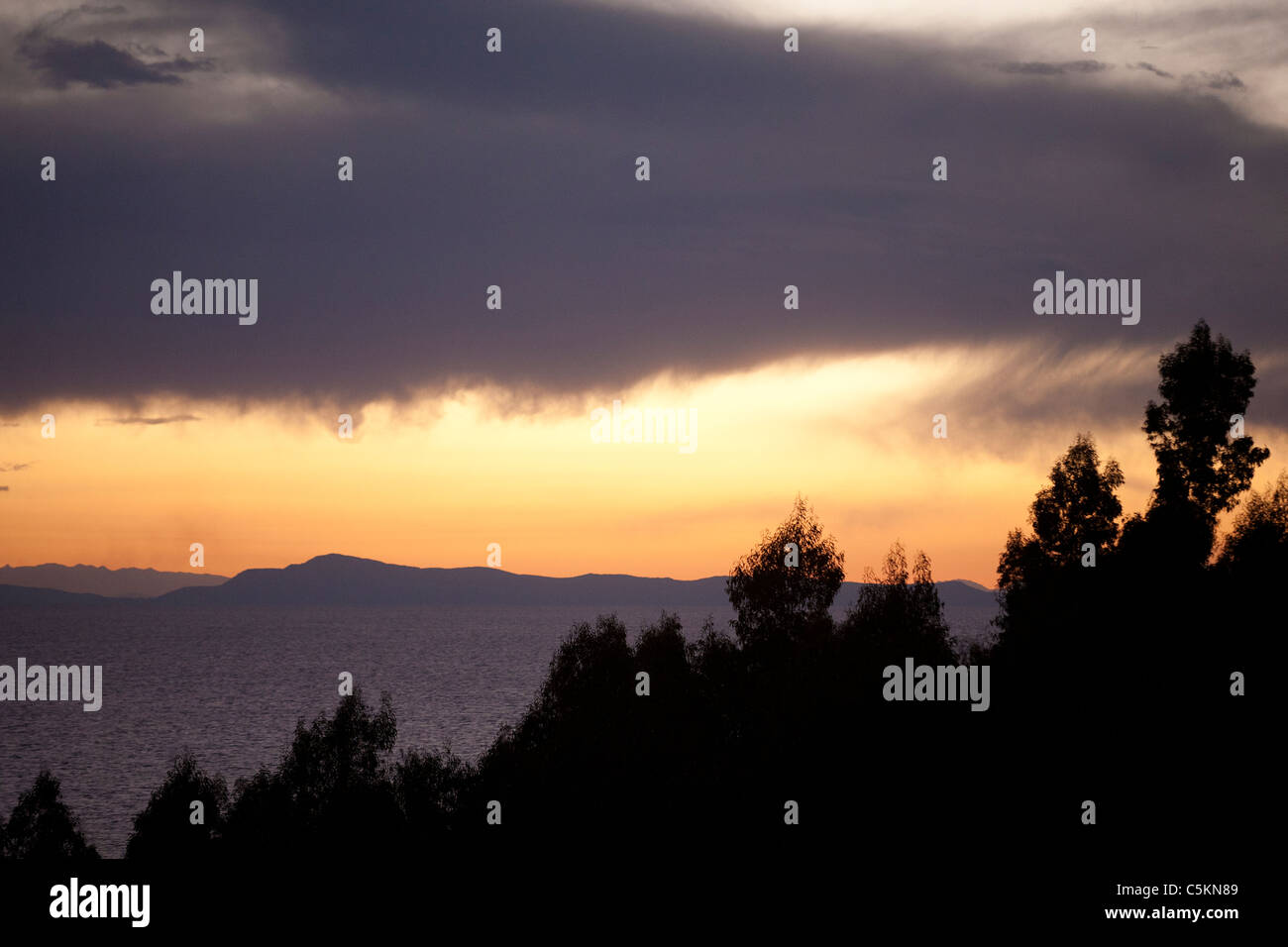 Sunset across Lake Titicaca viewed from Suasi, the only private island ...