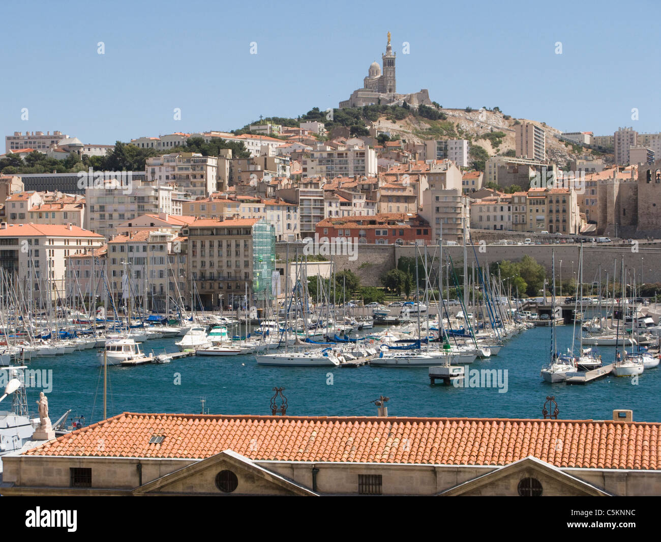 Marseille Harbour, France, with yacht marina, surrounded by houses and ...