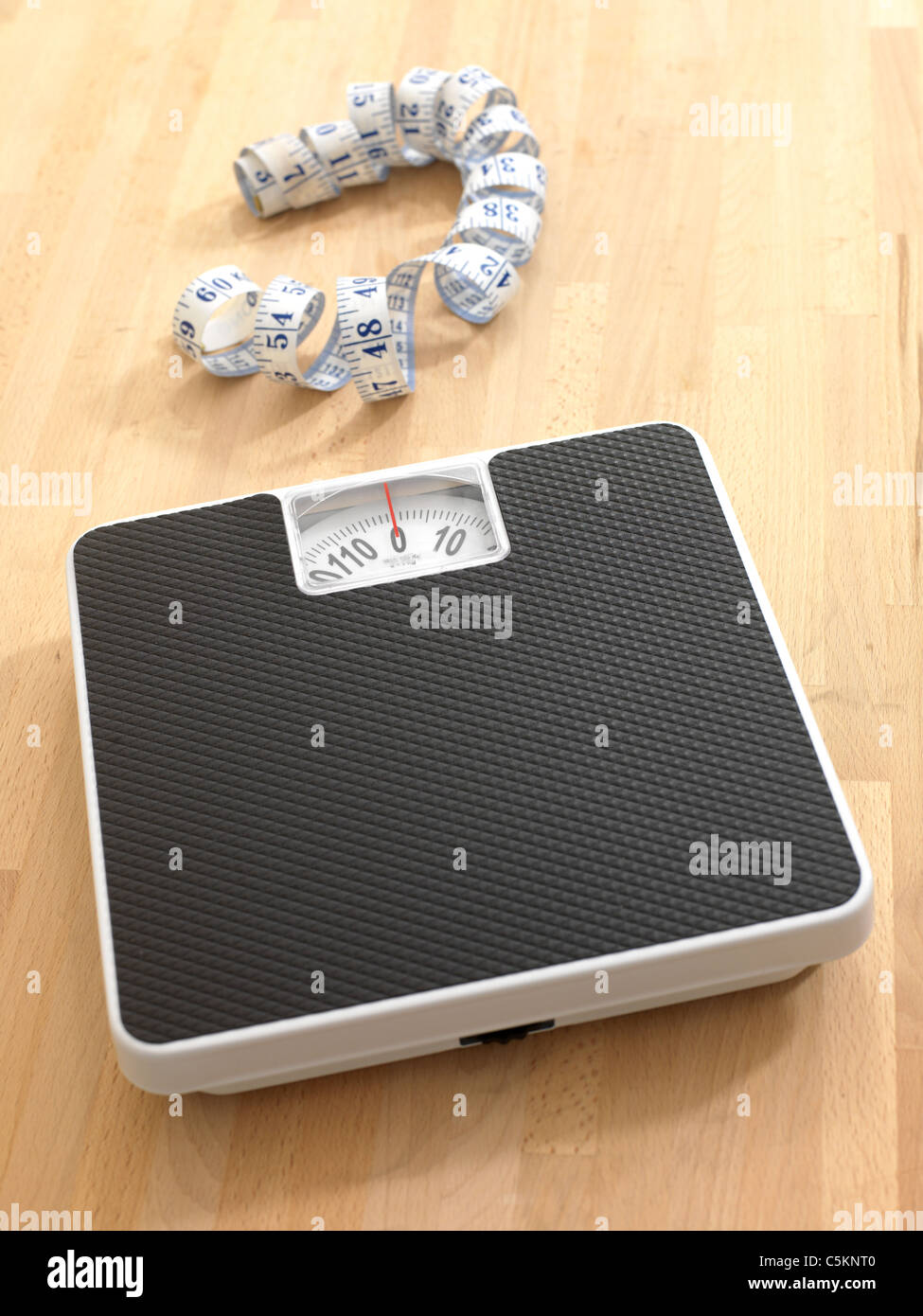Bathroom scales isolated against a white background Stock Photo - Alamy