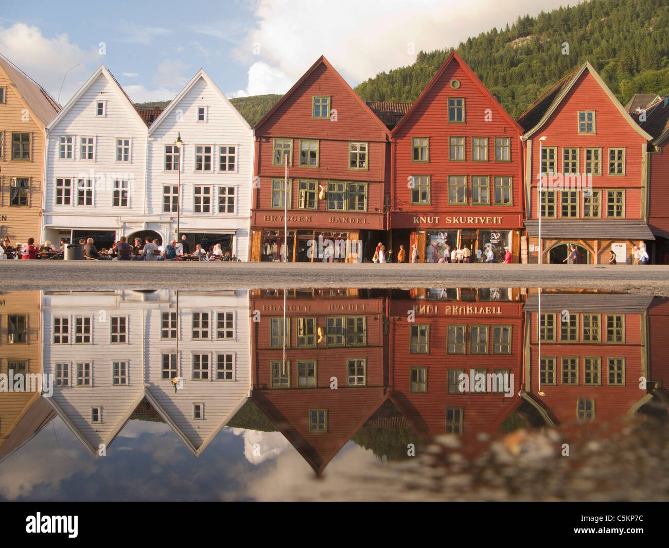 Old gabled timber houses in Bryggen, Bergen, Norway with reflection in ...