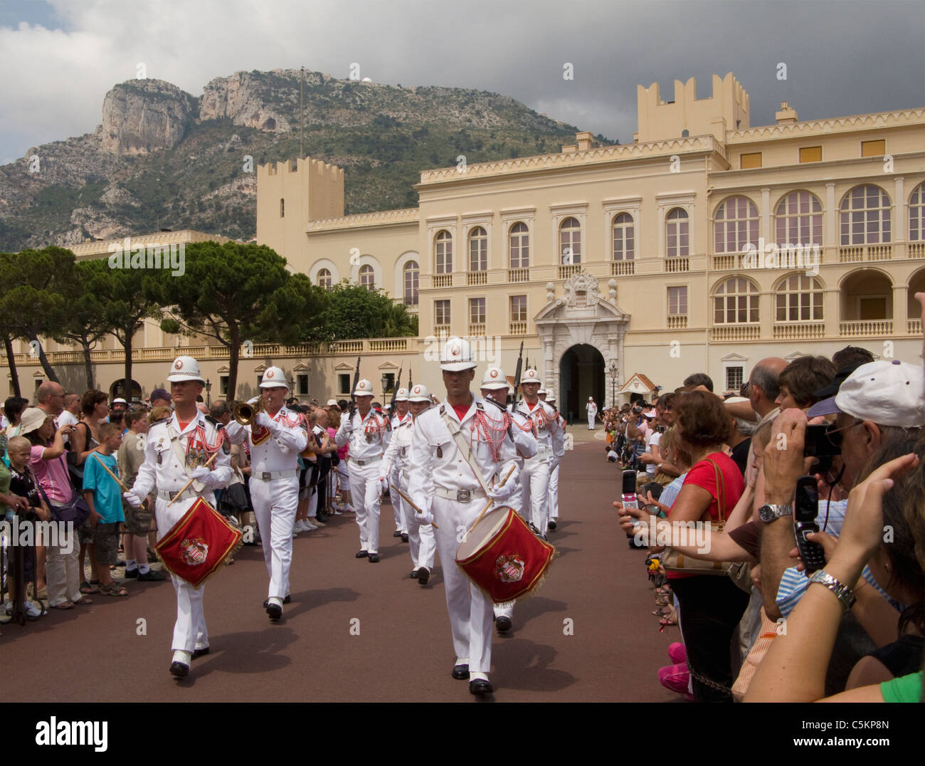 Changing the guard at Royal Palace, Monaco, with old guard marching ...