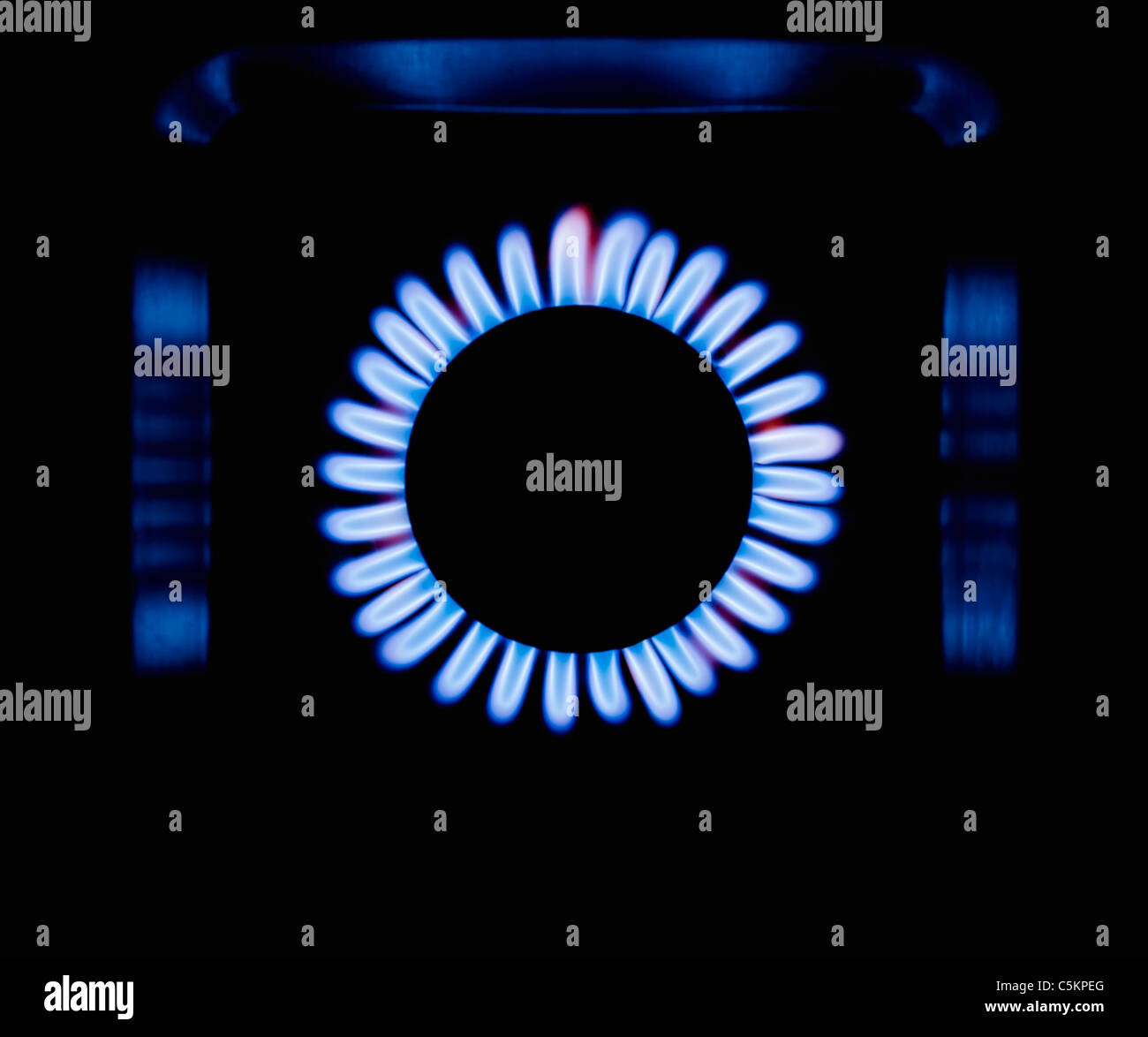 Gas flames radiating from circular burner of gas stove Stock Photo - Alamy