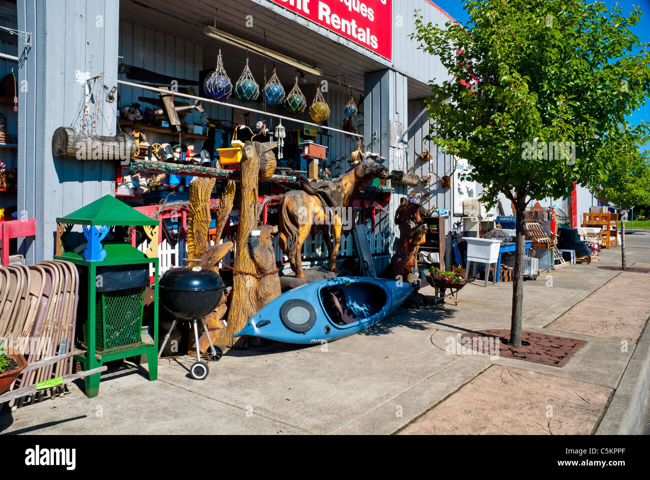 Antiquities store display in a small rural town Stock Photo - Alamy
