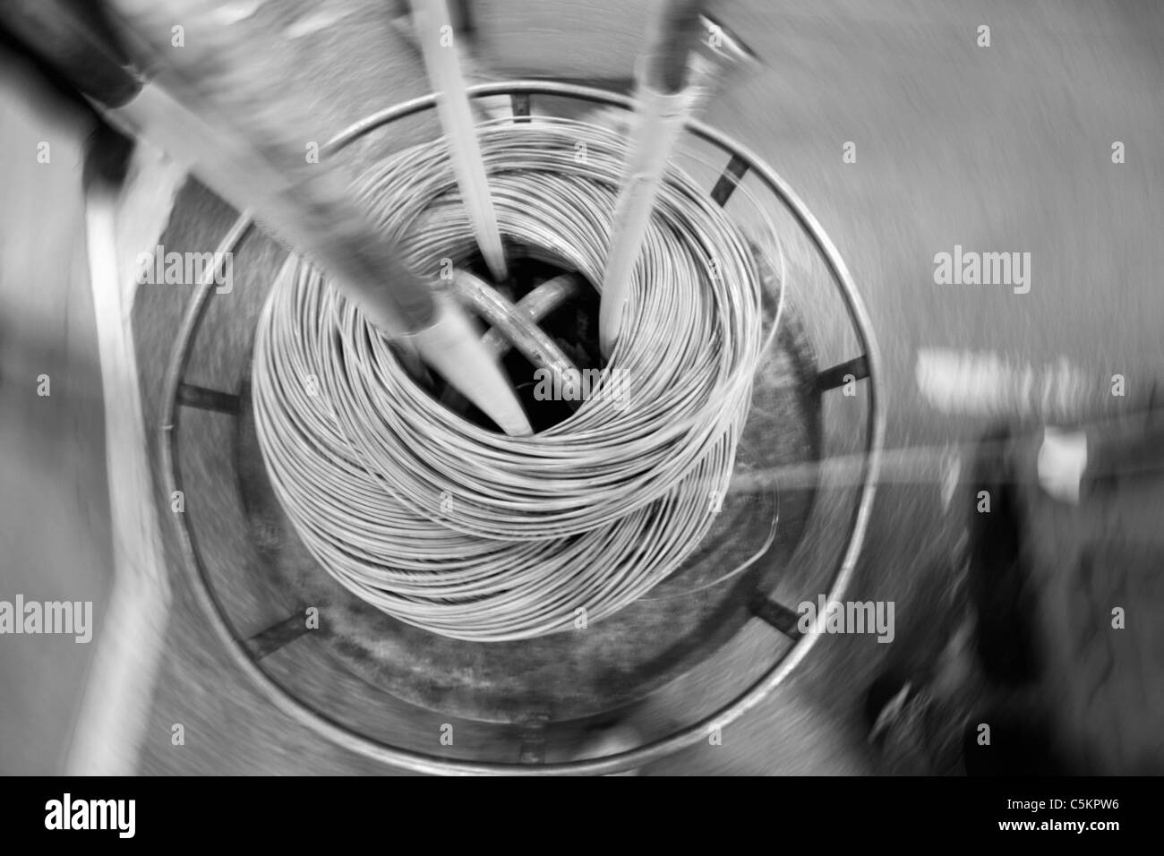 Wire spindal feeding screw / bolt machine Stock Photo - Alamy