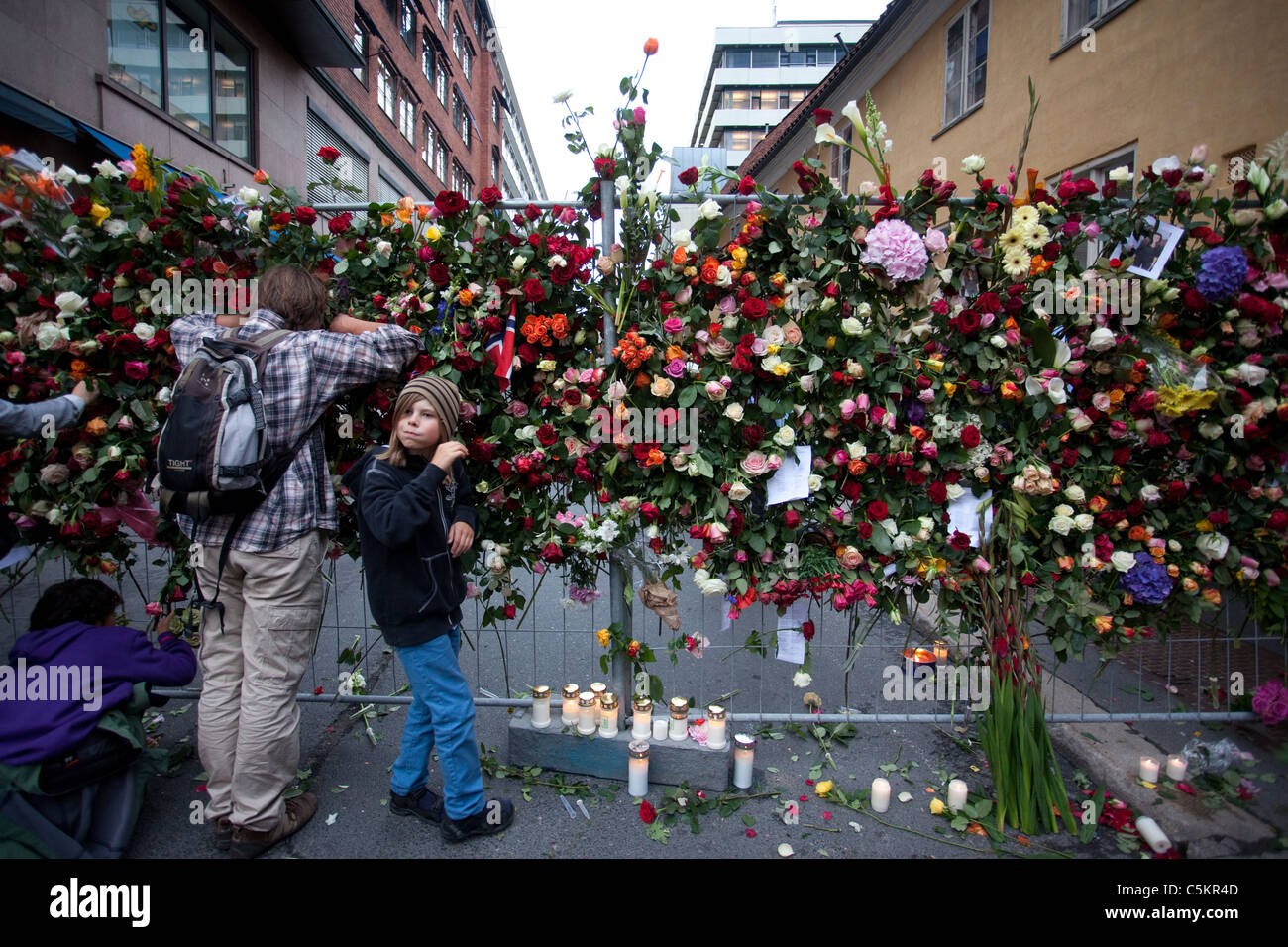 Thousands of Norwegian's laid a rose flower in the city of Oslo as part ...
