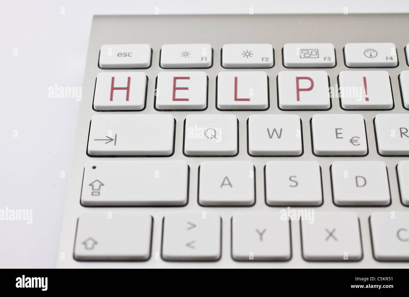 red "HELP!" on white keyboard Stock Photo - Alamy