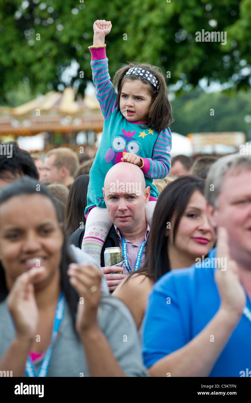 The 15000 strong crowd enjoys the music and free ice cream. The ...