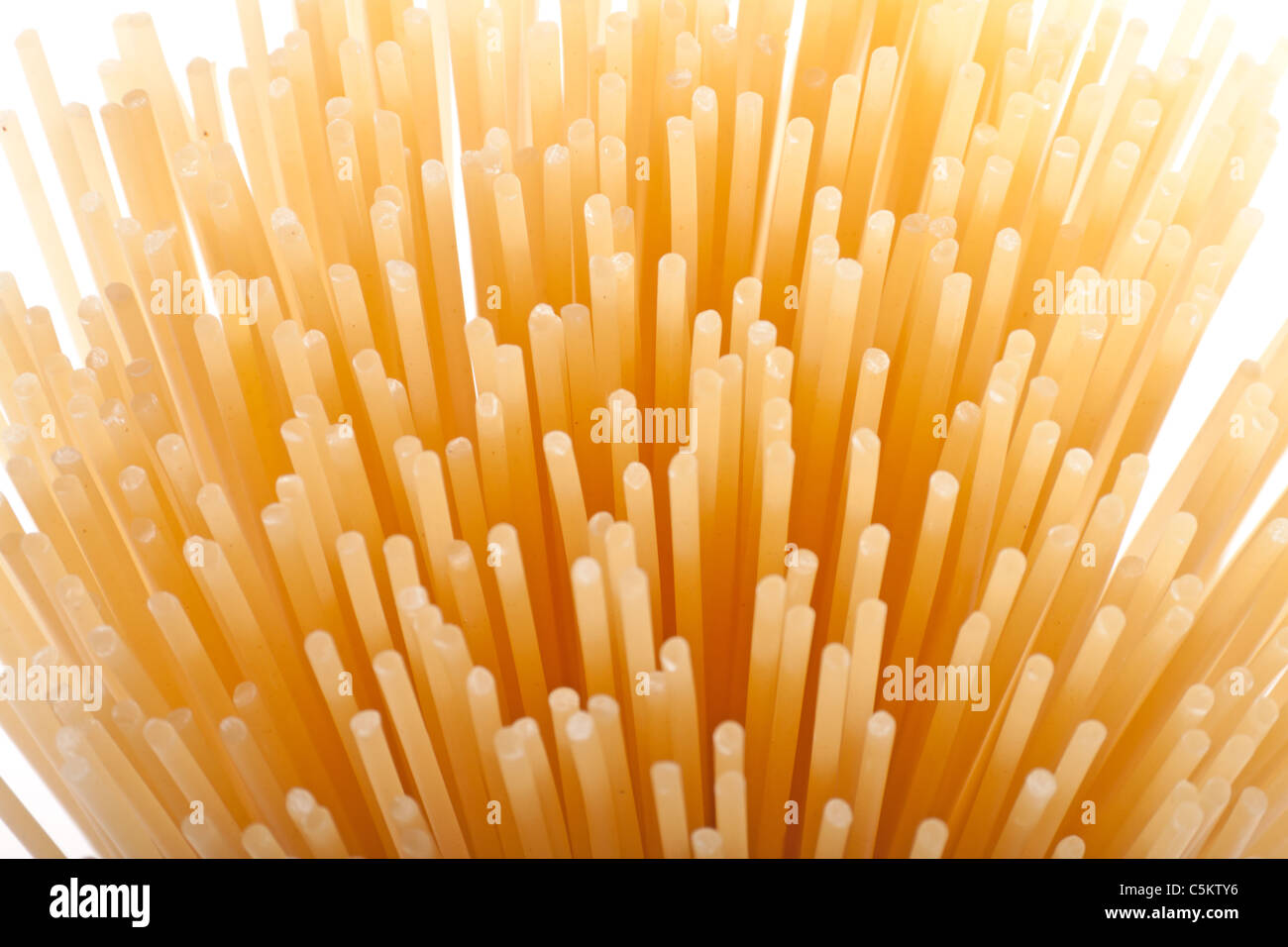 uncooked spaghetti, photo on the white background Stock Photo - Alamy
