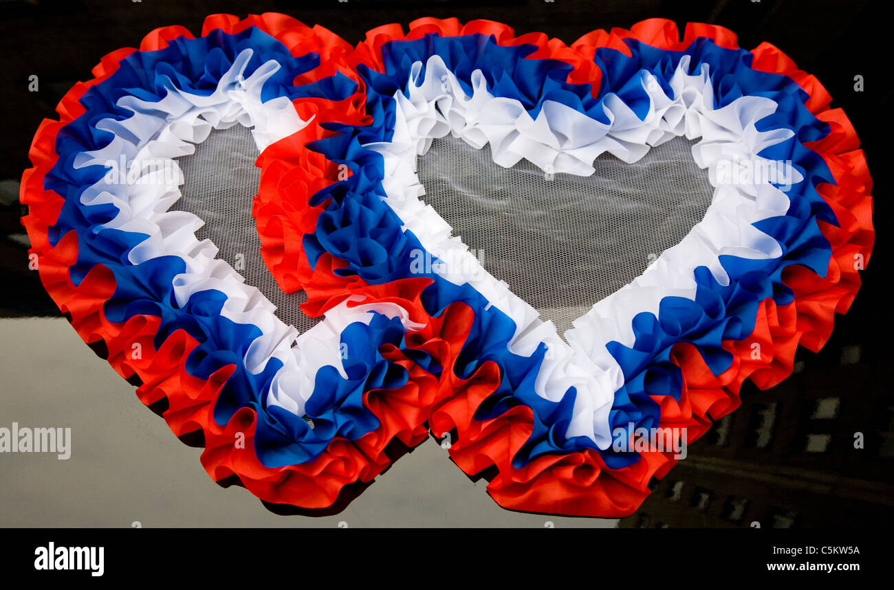 Two white hearts ribbon hi-res stock photography and images - Alamy