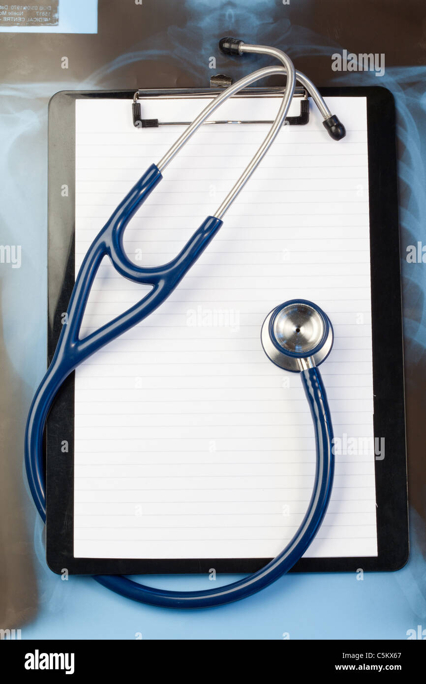 Note pad and blue stethoscope Stock Photo - Alamy