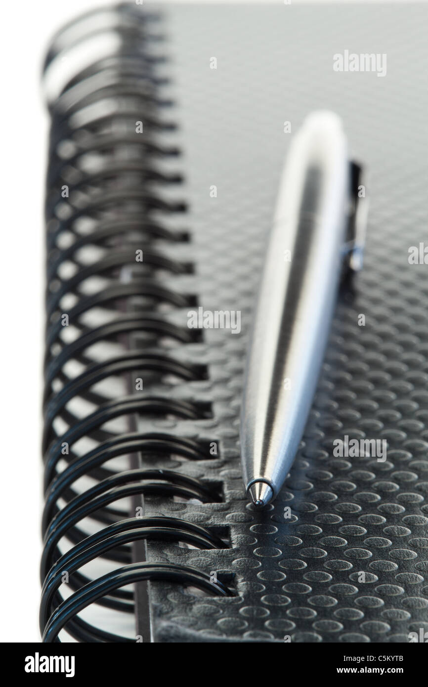Black agenda and pen Stock Photo - Alamy