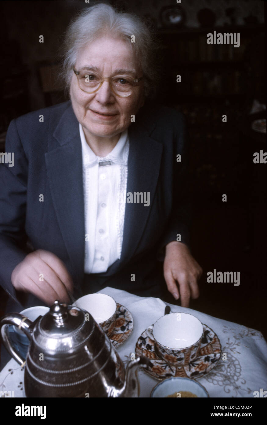 Old woman having afternoon tea hi-res stock photography and images - Alamy