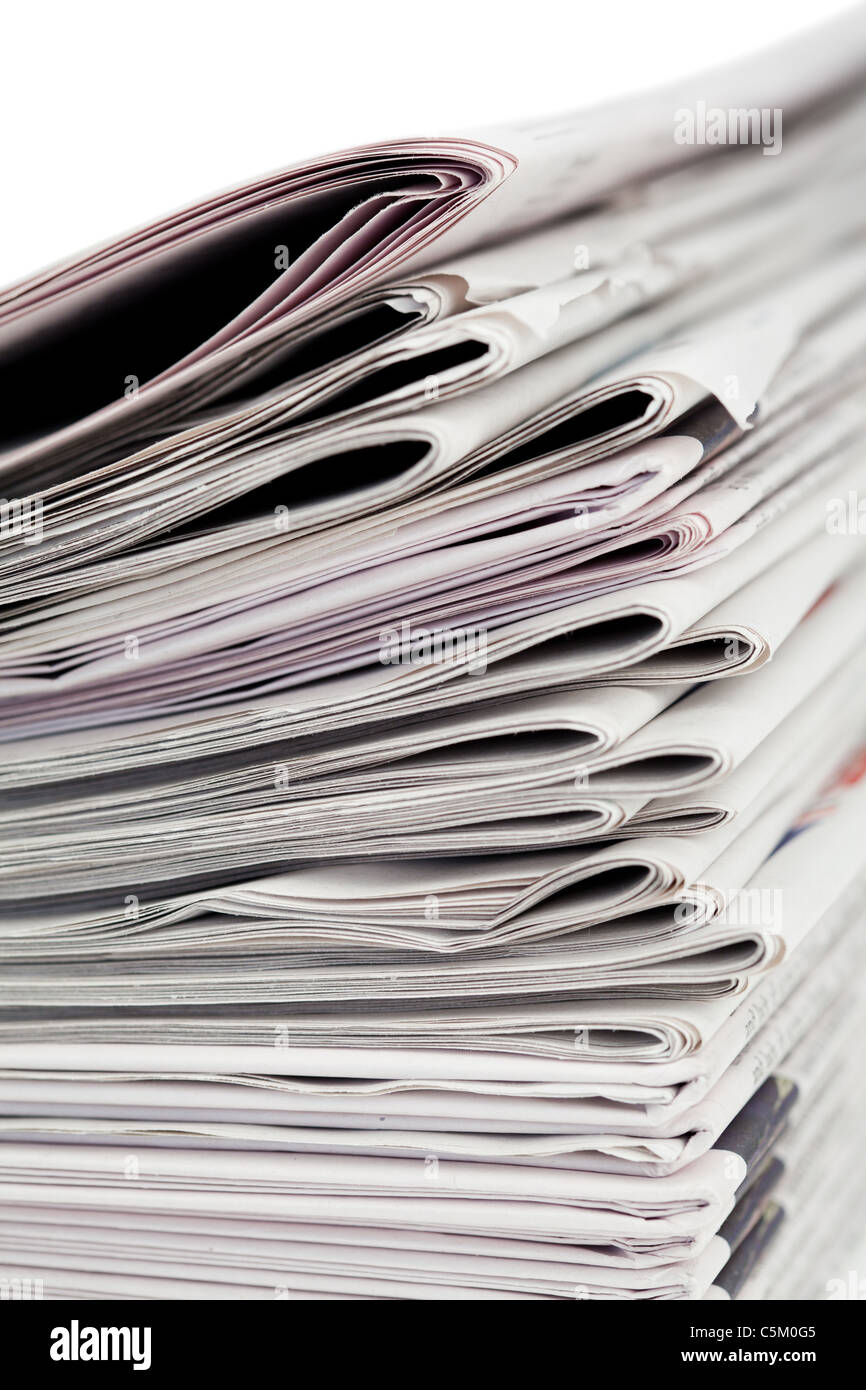 News of the world newspaper pile hi-res stock photography and images ...