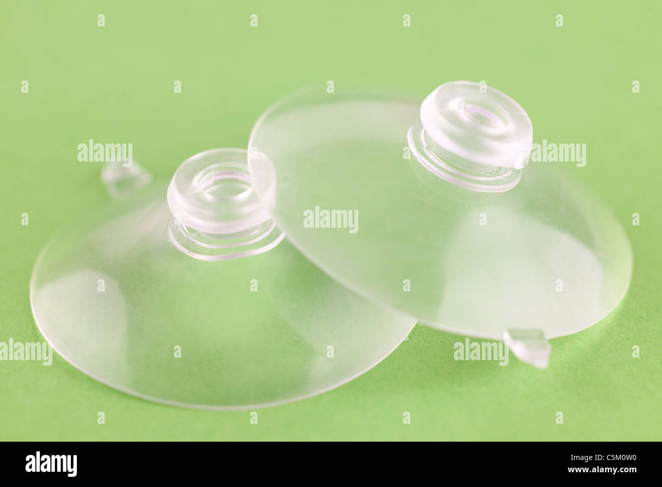 Two clear rubber suckers Stock Photo - Alamy