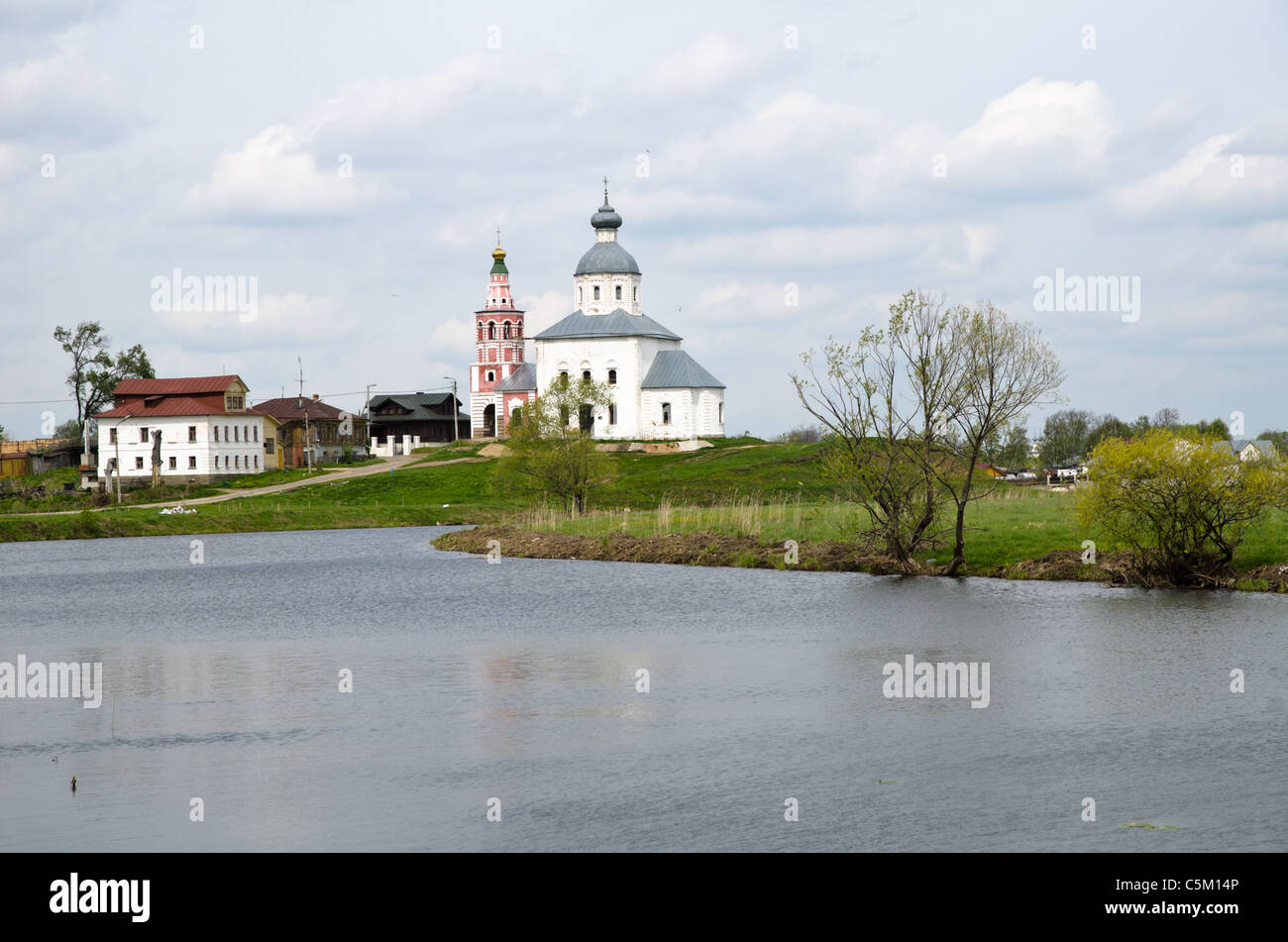 River view to the ancient Christian church in the Suzdal town Stock ...