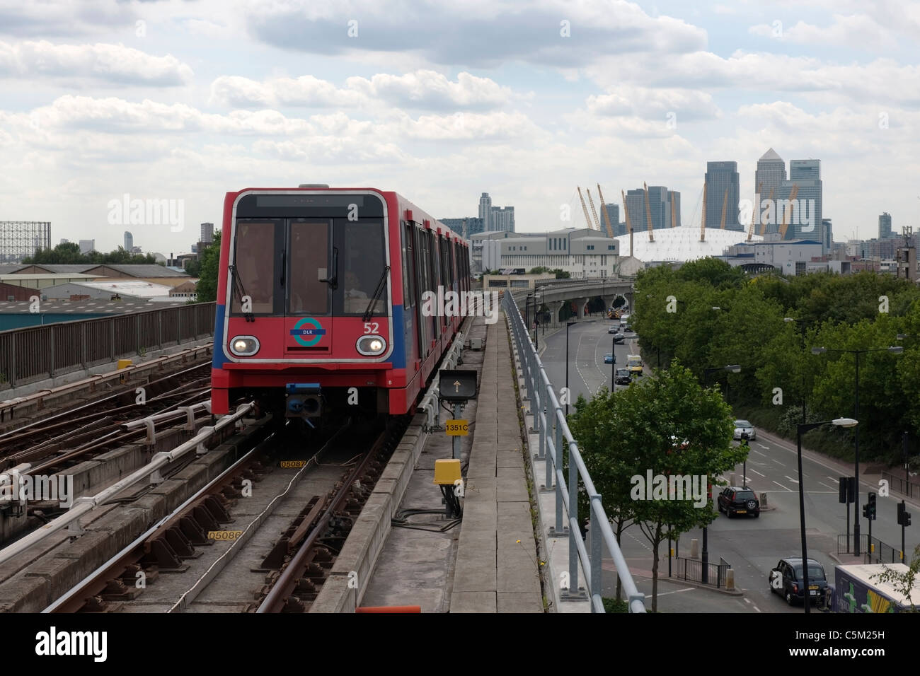 Docklands Light Railway Train approaching Pontoon Dock Station Stock ...