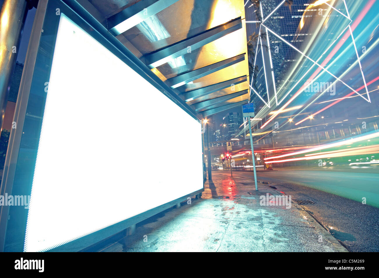 white display advertising with traffic at night Stock Photo - Alamy
