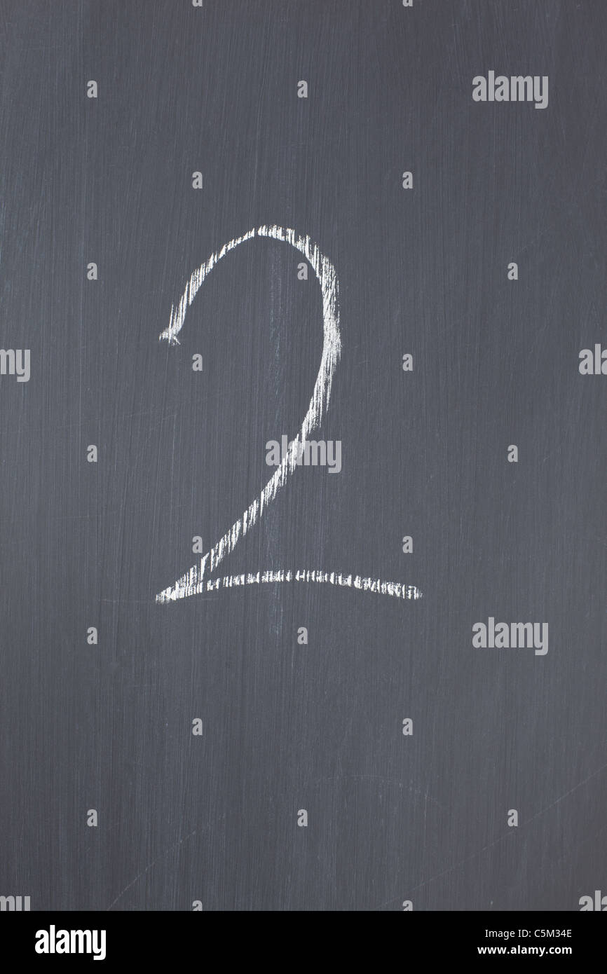 Blackboard with a two written on it Stock Photo - Alamy