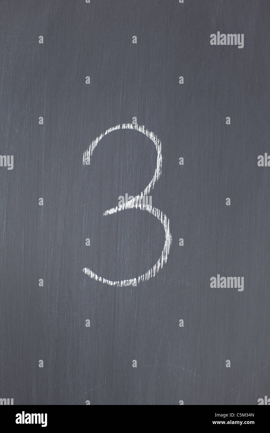 Blackboard with a three written on it Stock Photo - Alamy