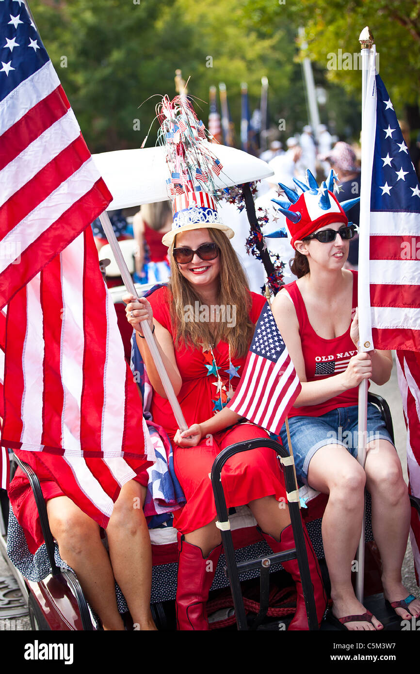 A woman dressed in patriotic costume in the I'On Community 4th of July ...