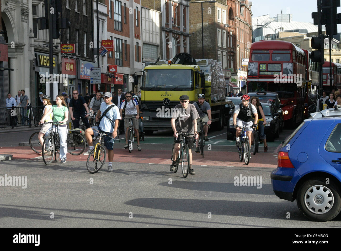 London buses and cars hi-res stock photography and images - Alamy