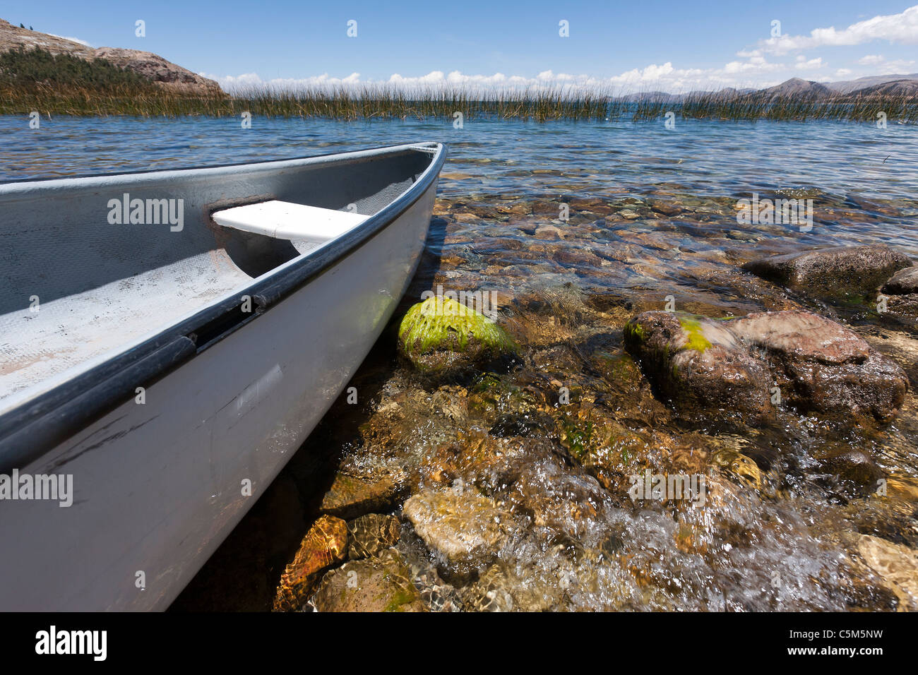 A Canadian canoe ready for paddling on Lake Titicaca from Suasi, the ...