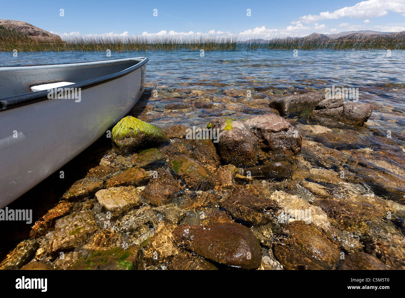 A Canadian canoe ready for paddling on Lake Titicaca from Suasi, the ...